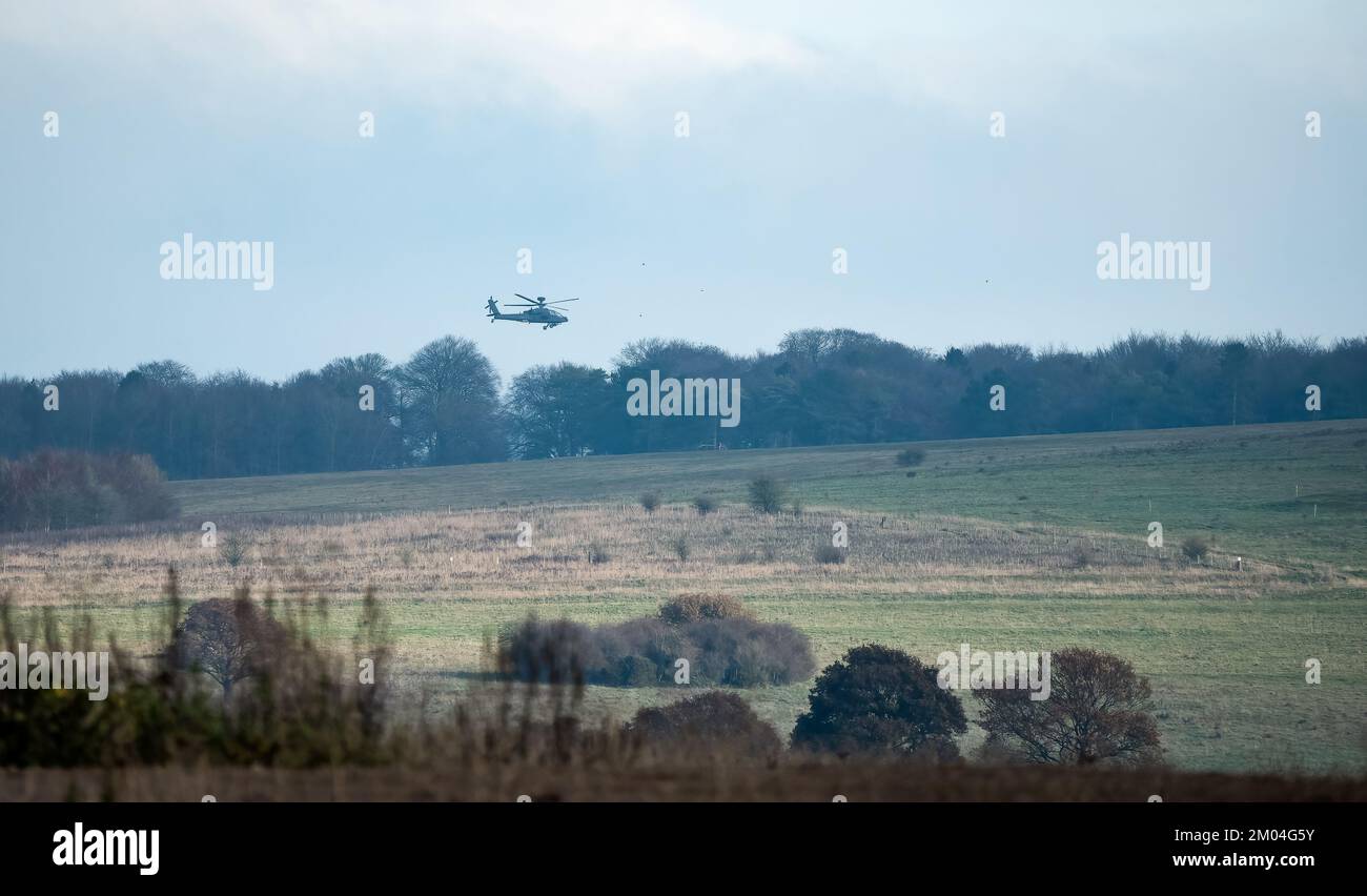 British army Boeing Apache Attack helicopter (AH-64E ArmyAir606) in low ...