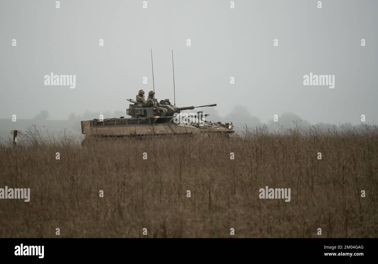 British army Warrior FV510 infantry fighting vehicle in action on a ...