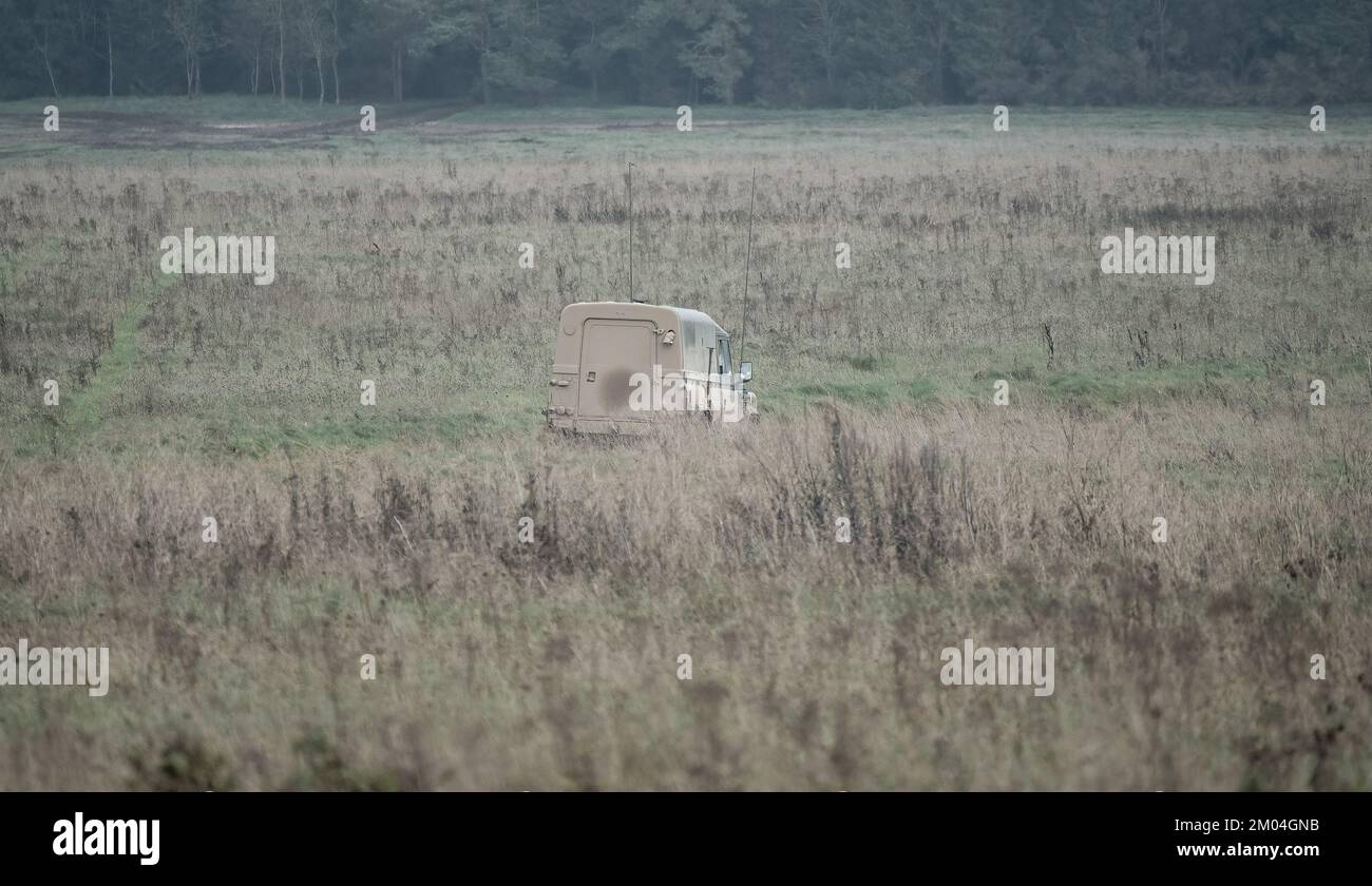 British army Land Rover Defender Wolf light utility vehicle moving ...