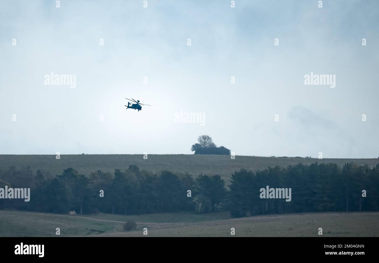 British army Boeing Apache Attack helicopter (AH-64E ArmyAir606) in low ...