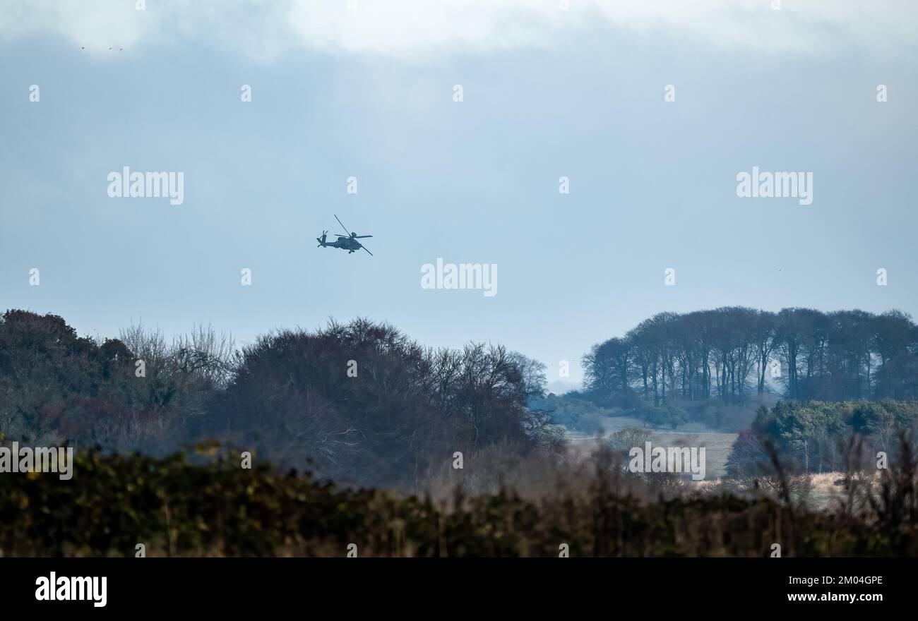 British army Boeing Apache Attack helicopter (AH-64E ArmyAir606) in low ...