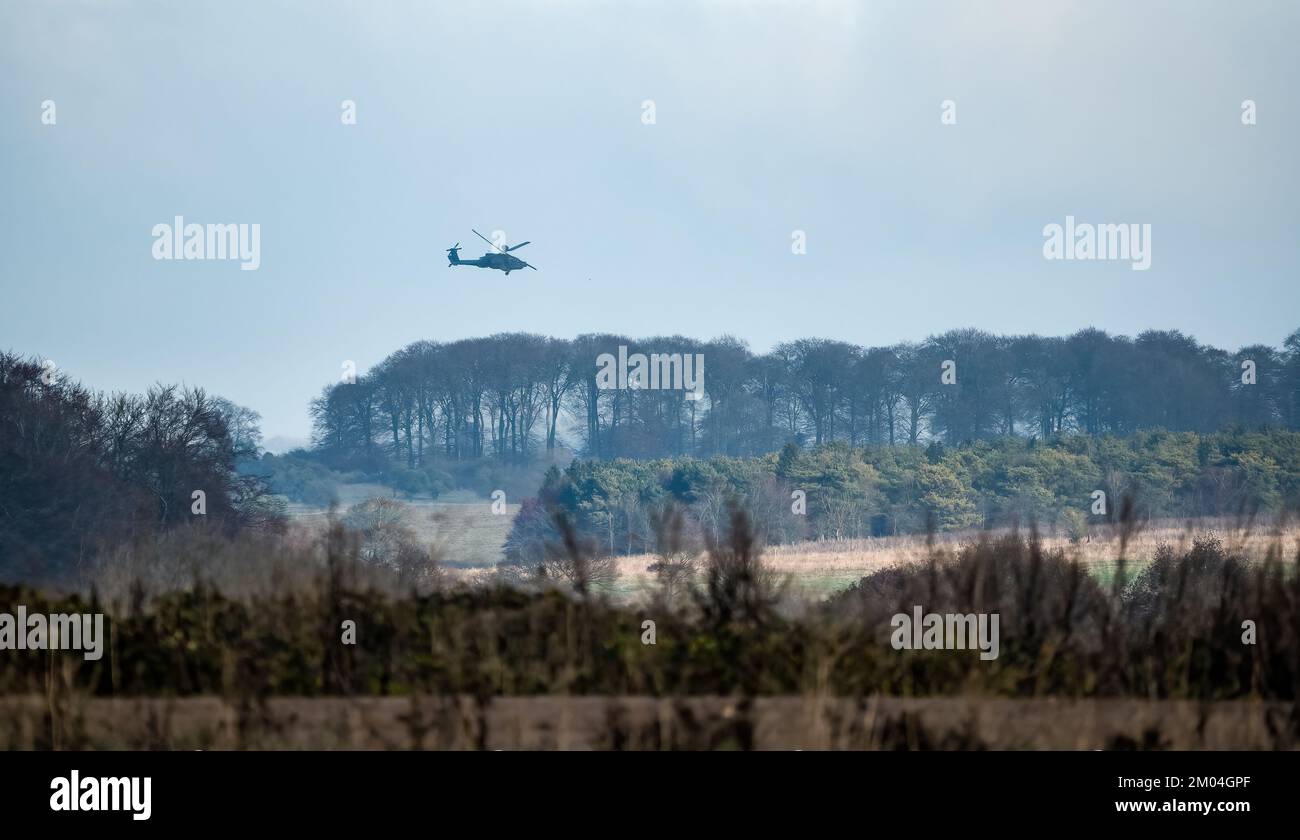 British army Boeing Apache Attack helicopter (AH-64E ArmyAir606) in low ...
