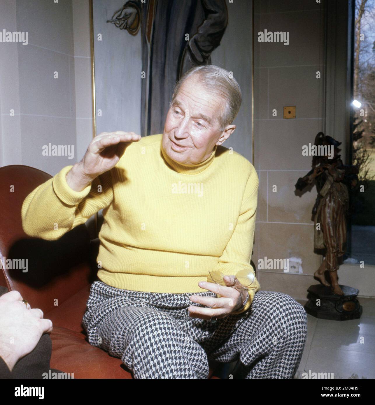 Maurice Chevalier. French actor 1888-1972. Pictured in his home in ...