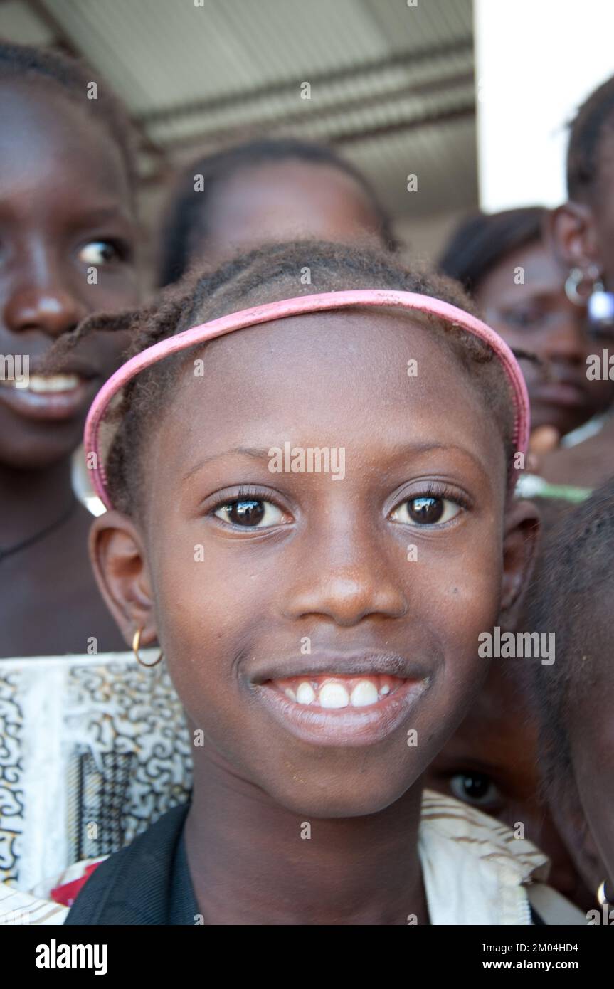 Faces of Africa, young girl, Bafata, Guinea Bissau. Young girl with a ...