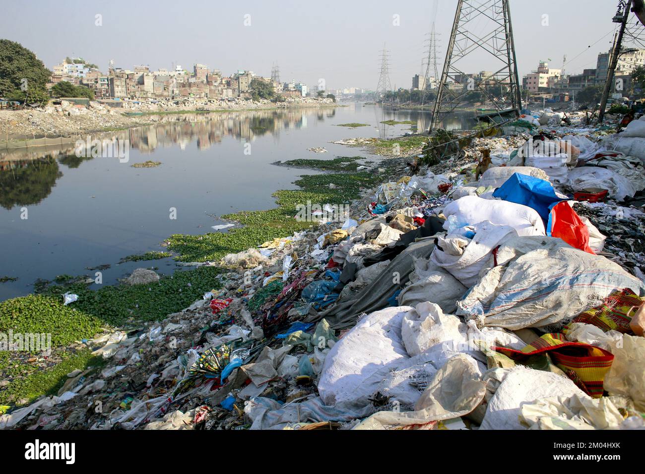 A garbage dumping yard on the bank of River Buriganga, in Dhaka ...