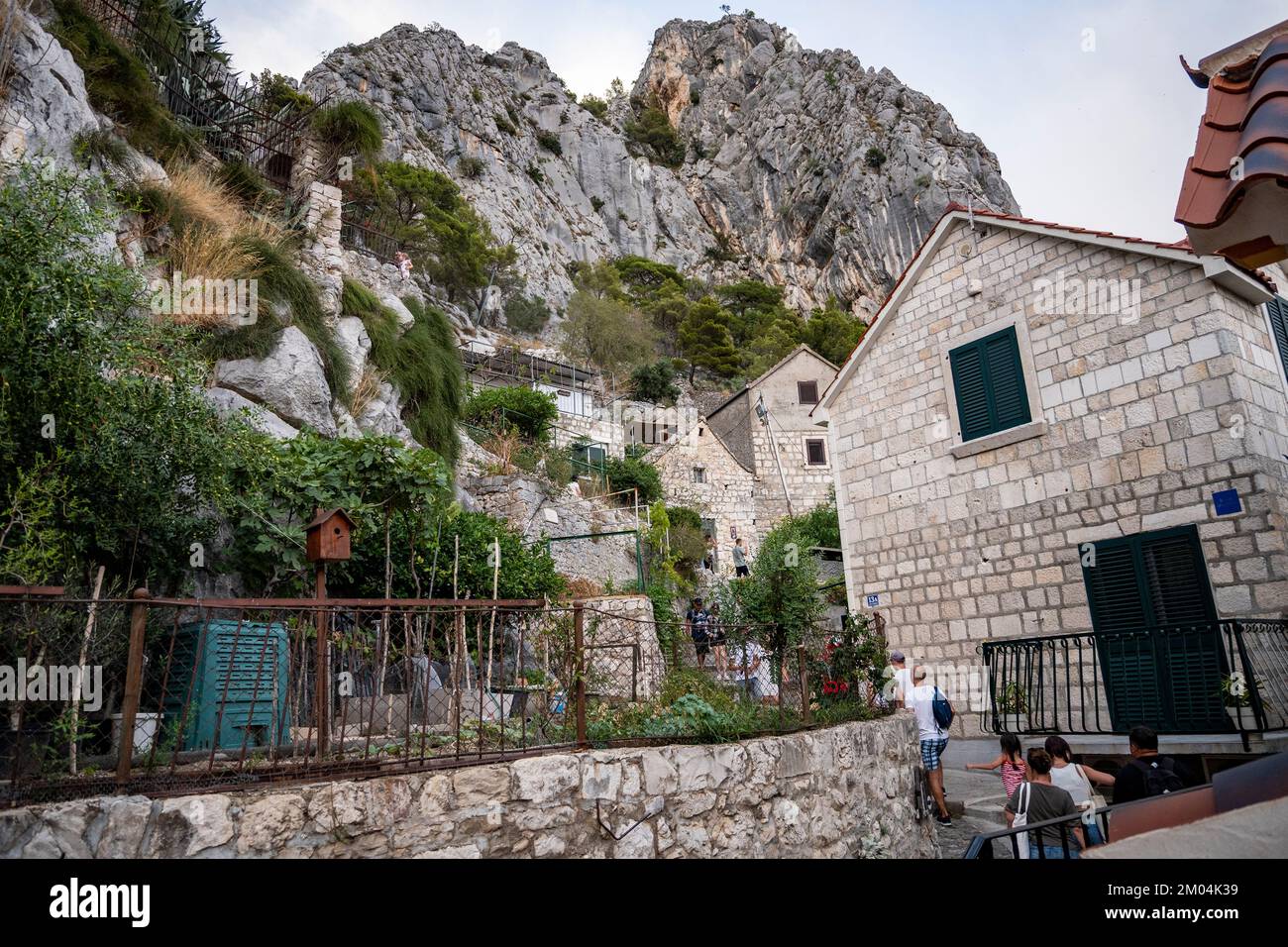 Omis, Croatia-August 18th, 2022: Tourists climbing stone stairs of ...