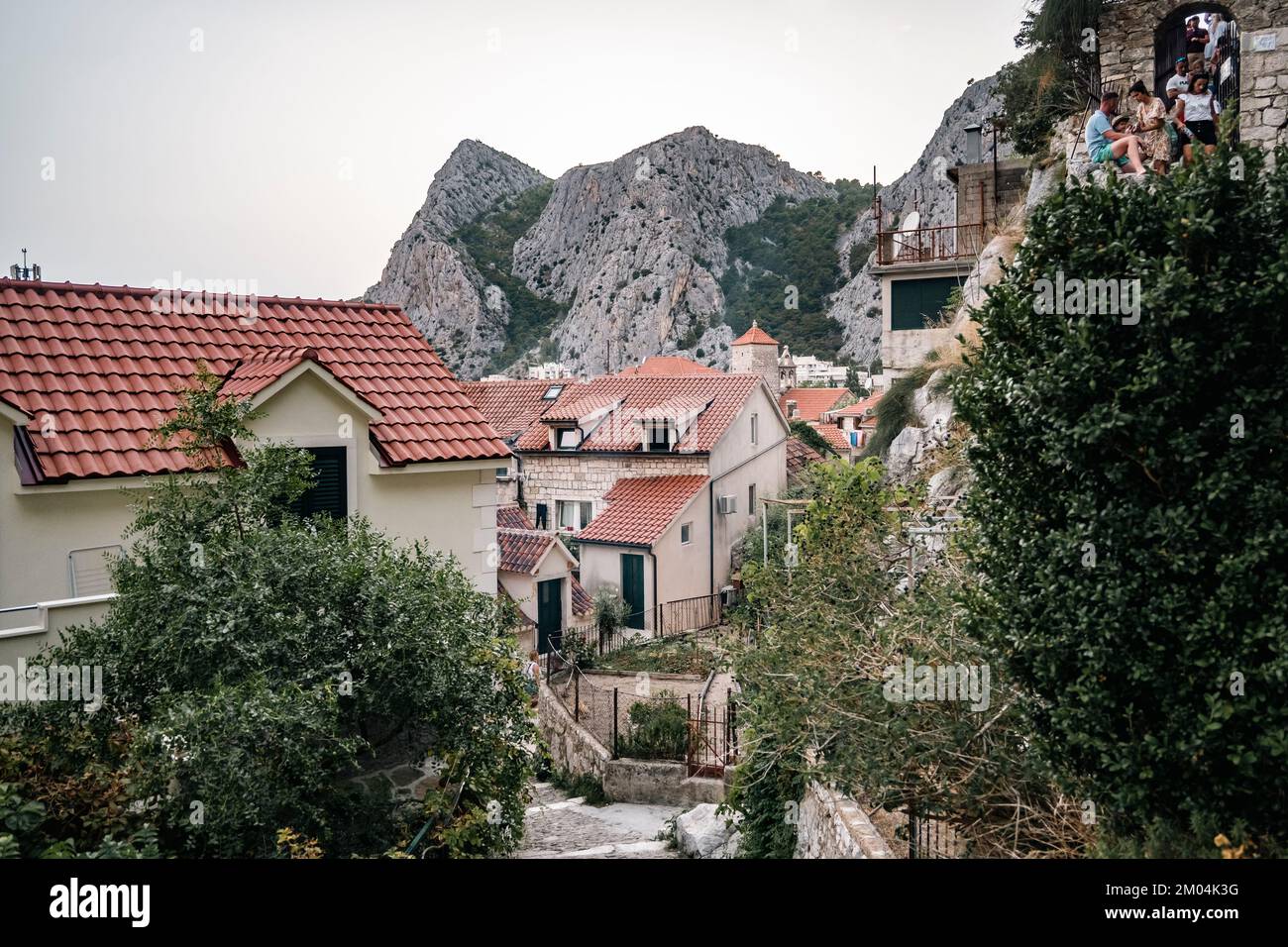 Omis, Croatia-August 18th, 2022: Tourists climbing stone stairs of ...