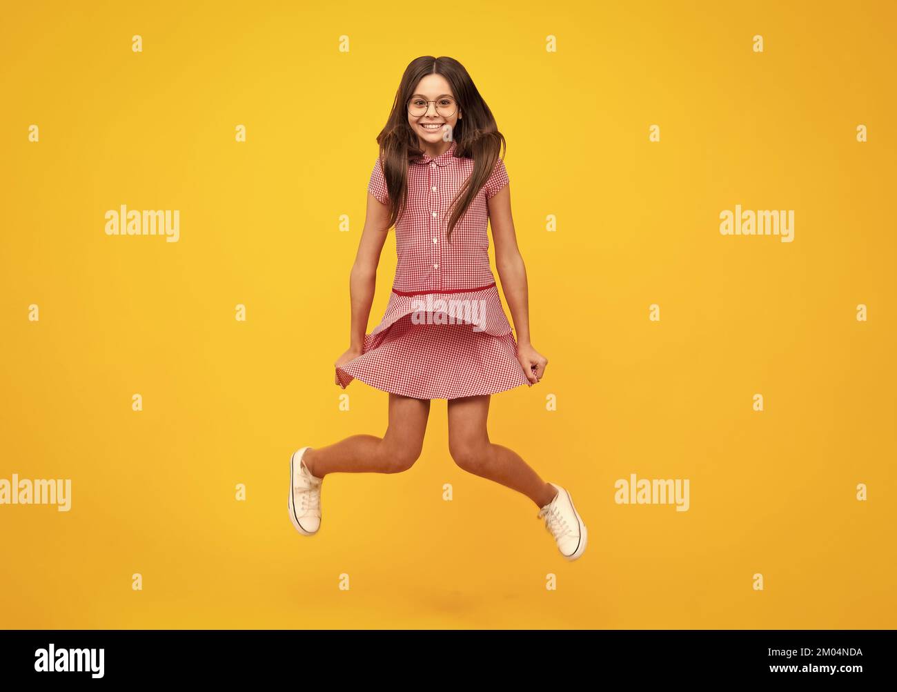 Full length cheerful teenager kid jump enjoy rejoice win isolated on ...