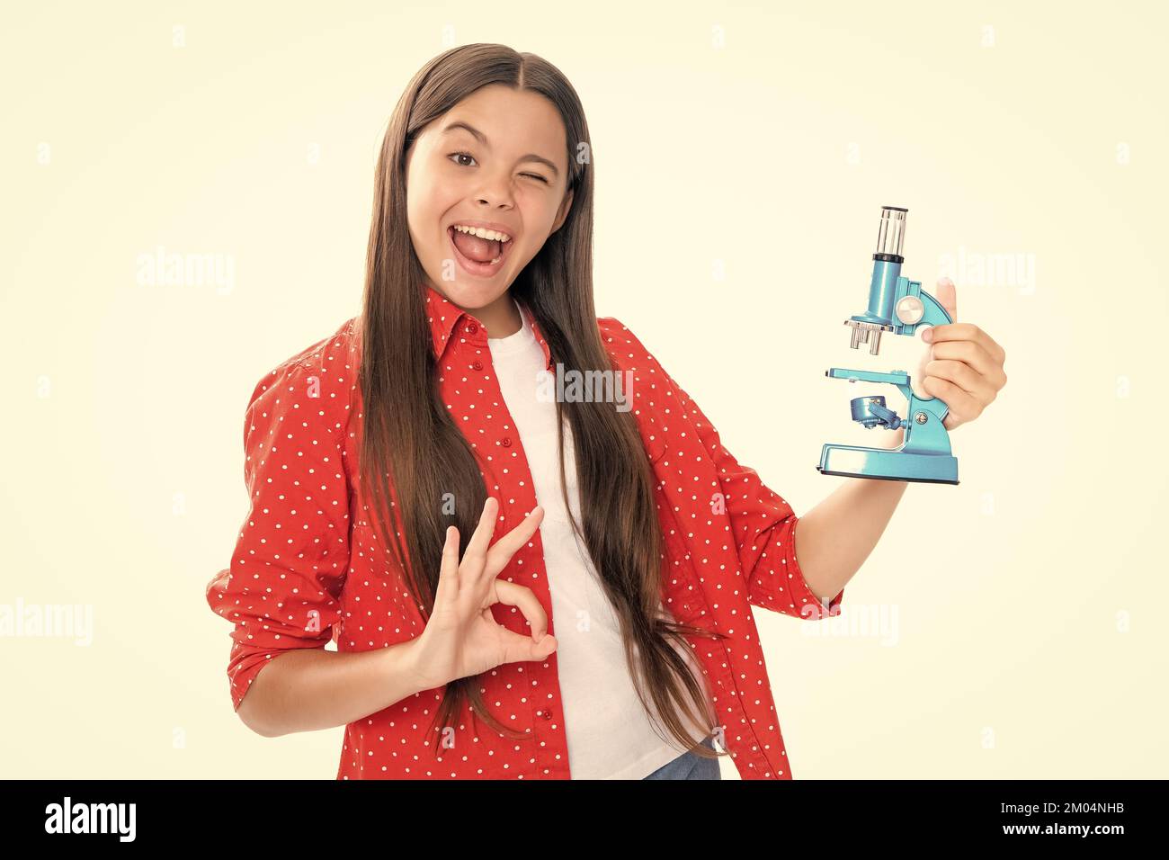 Child study bilogy lesson. Teenage school girl with microscope. Back to ...