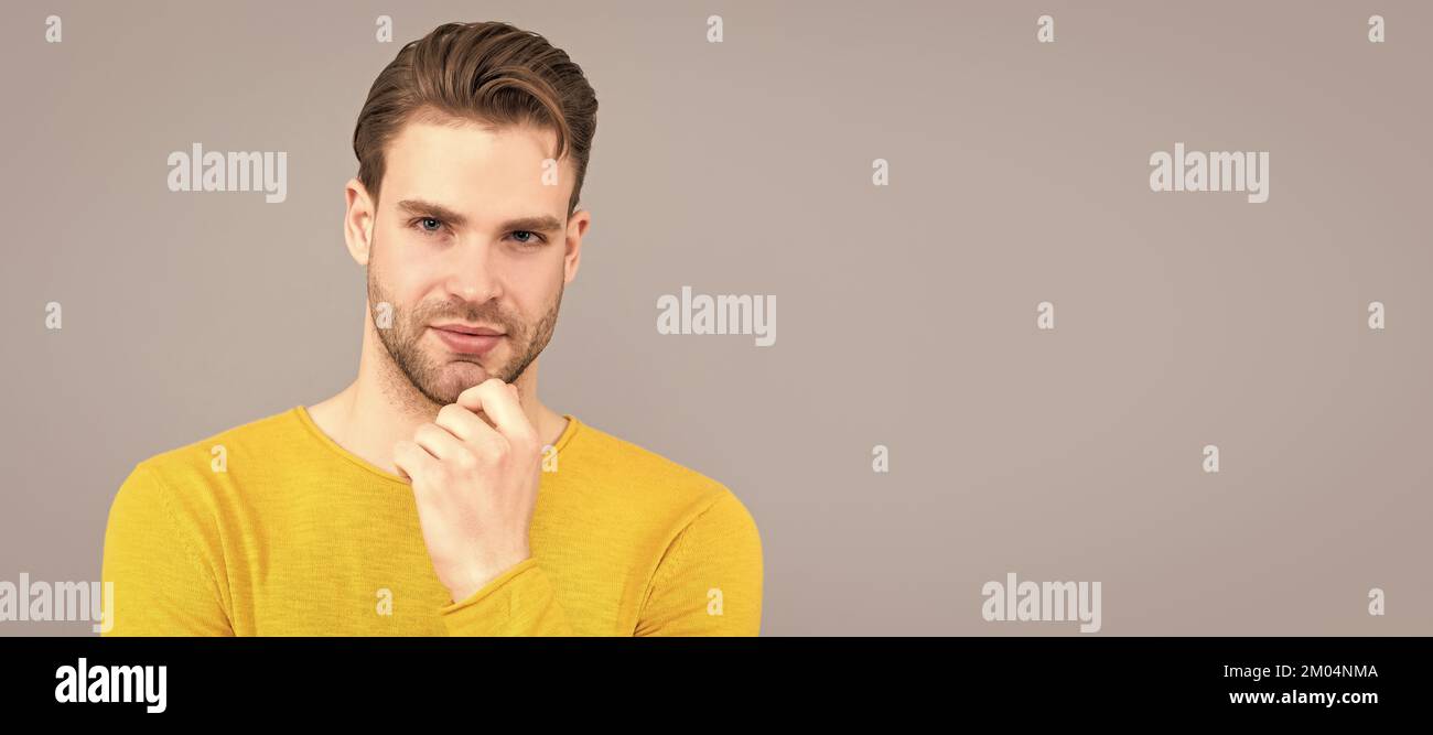 Handsome dude. Handsome man portrait grey background. Man face portrait, banner with copy space ...