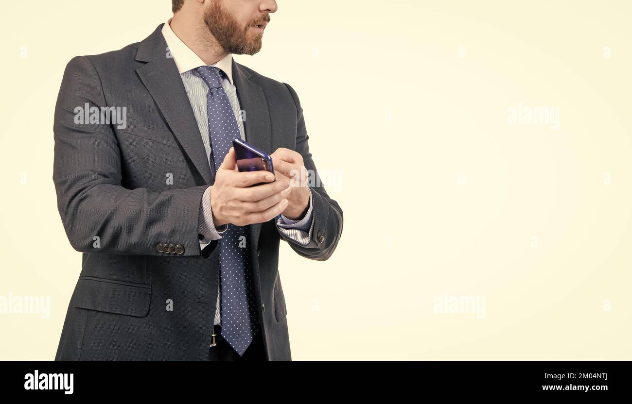 Professional man cropped view hold mobile phone isolated on white copy ...