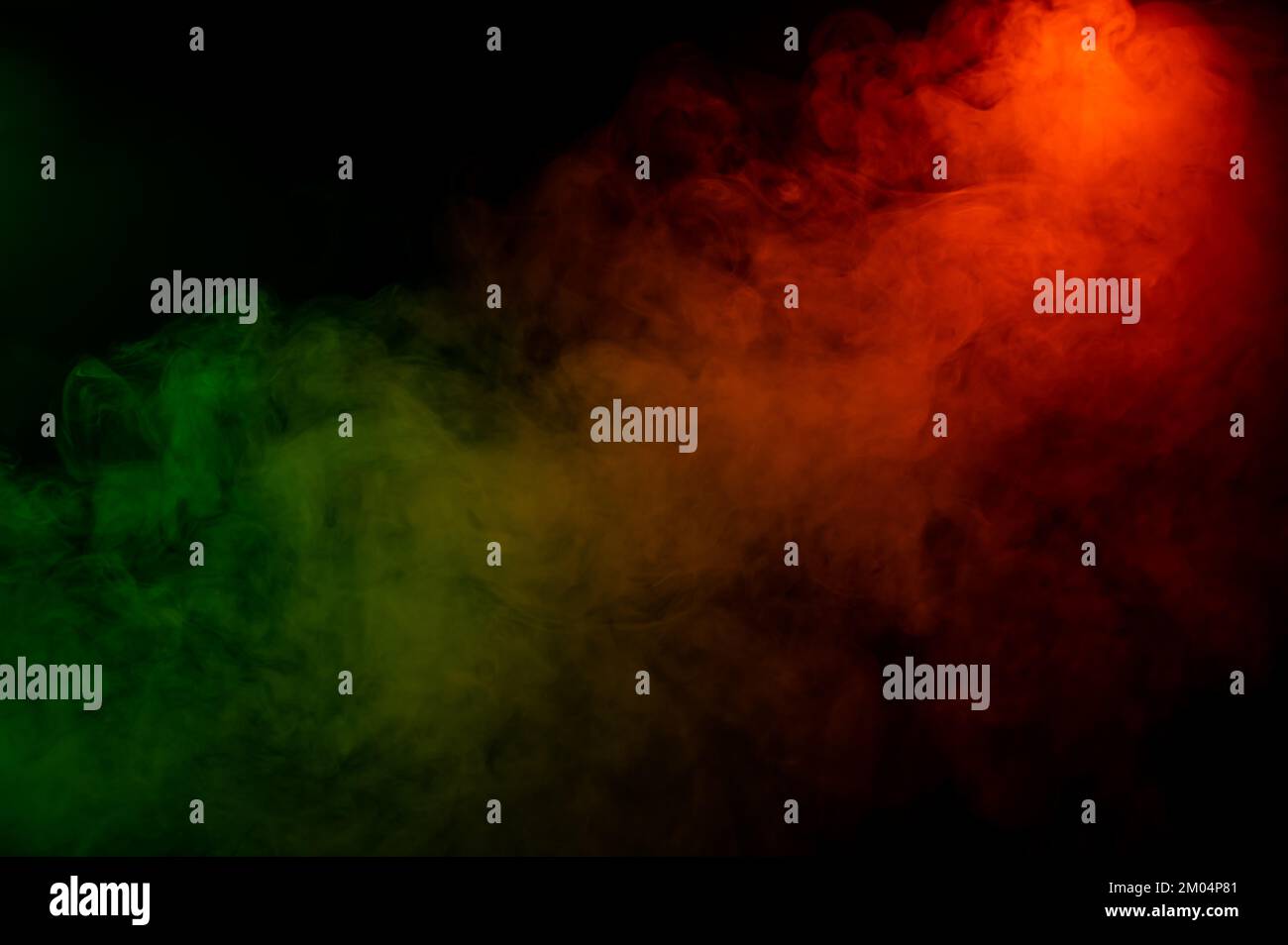 Red yellow green smoke on a black background Stock Photo - Alamy