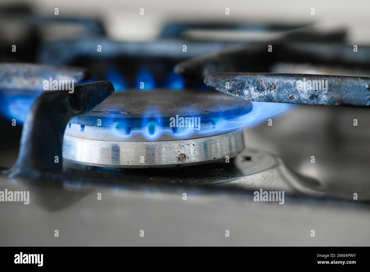 Gas burning from a kitchen gas stove, close-up Stock Photo - Alamy