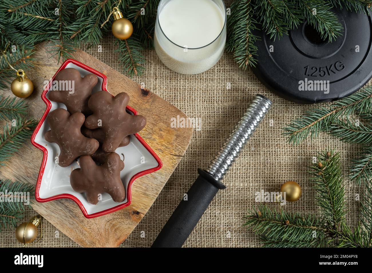 Chocolate gingerbread Christmas cookies, gym dumbbells weight plate ...
