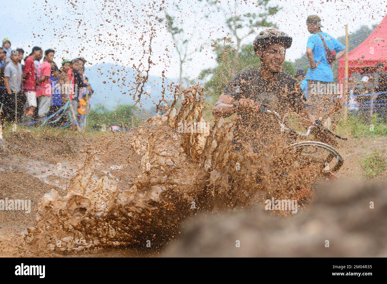 South Sulawesi, Indonesia. 4th Dec, 2022. A man participates in paddy ...