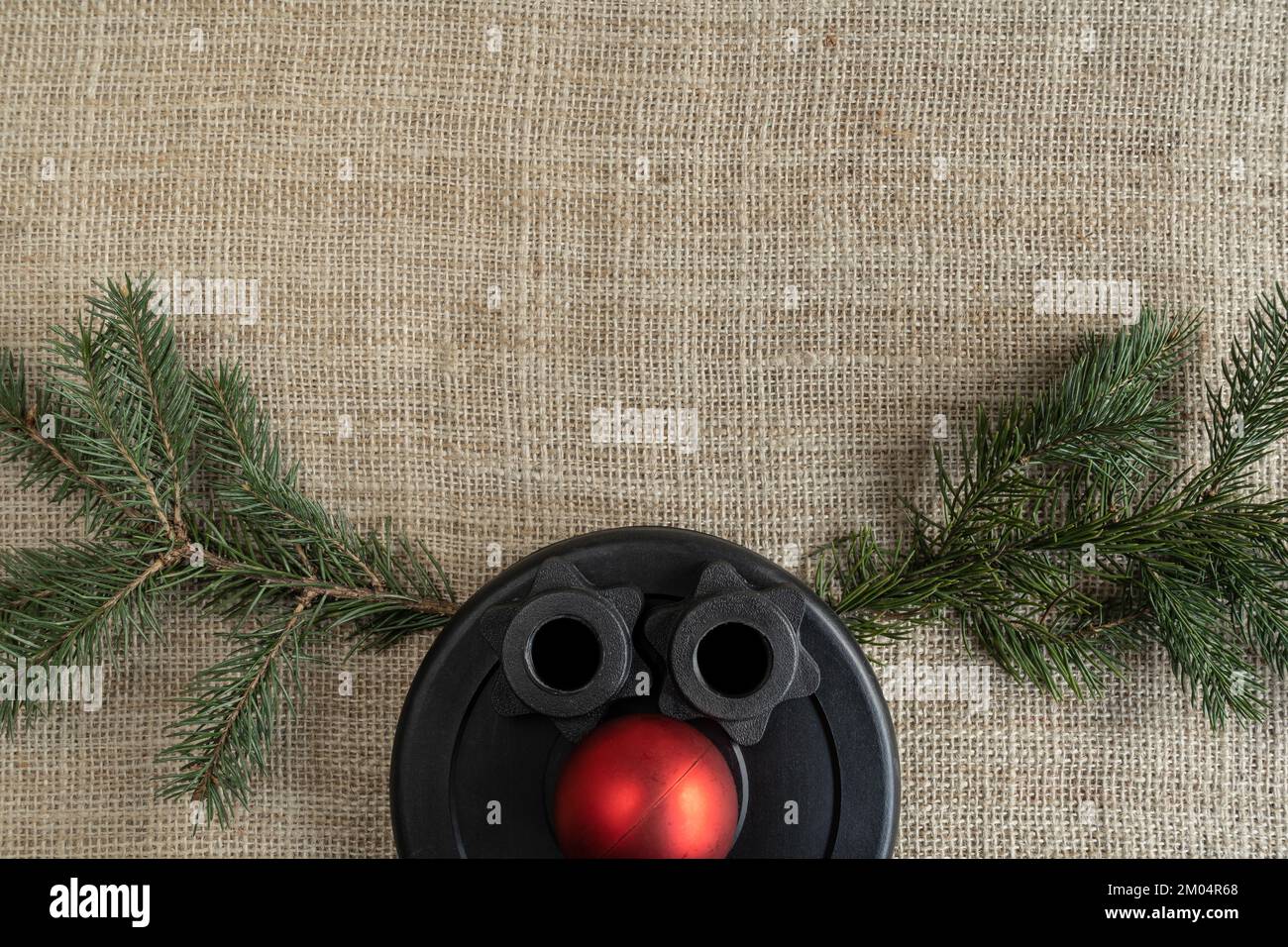 Gym dumbbell barbell weight plate disc shaped as reindeer. Christmas ...