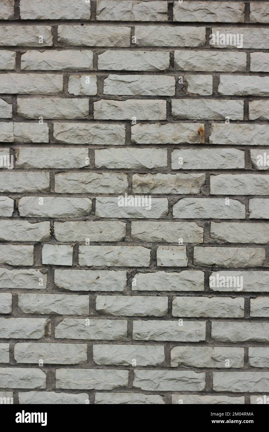 Typical common brick wall with layers of rectangular blocks Stock Photo ...
