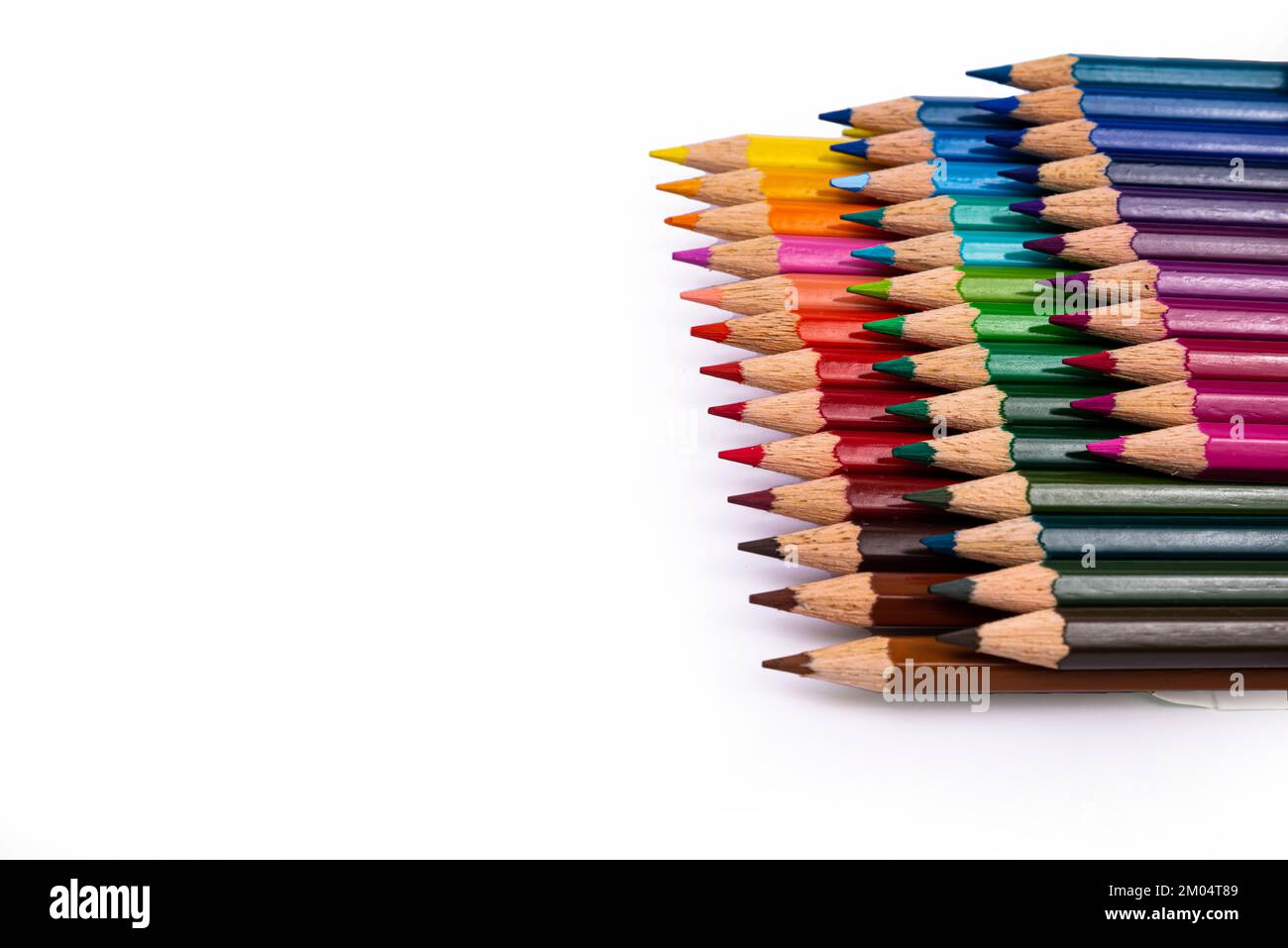 multi-colored pencils on multi-colored background, Close up, copy space ...