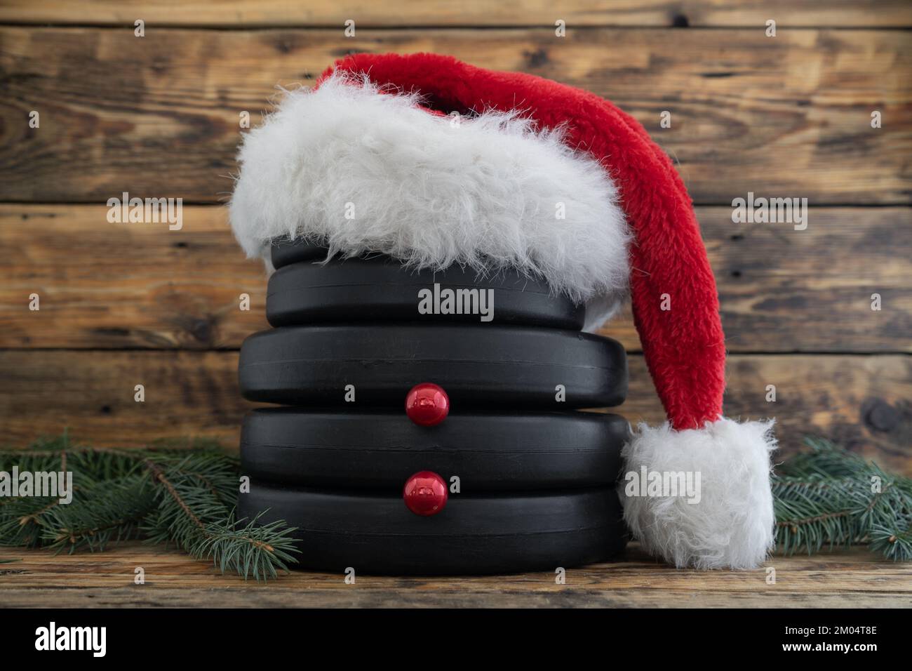 Dumbbell barbell weight plates in shape of snowman, with red Santa ...