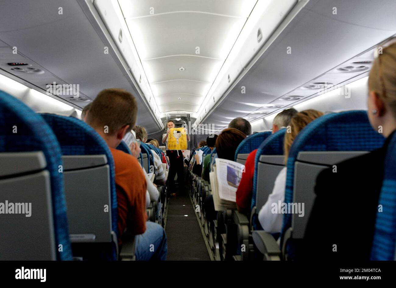 Finnair cabin crew, in airplanes at Arlanda Airport, demonstrate safety ...