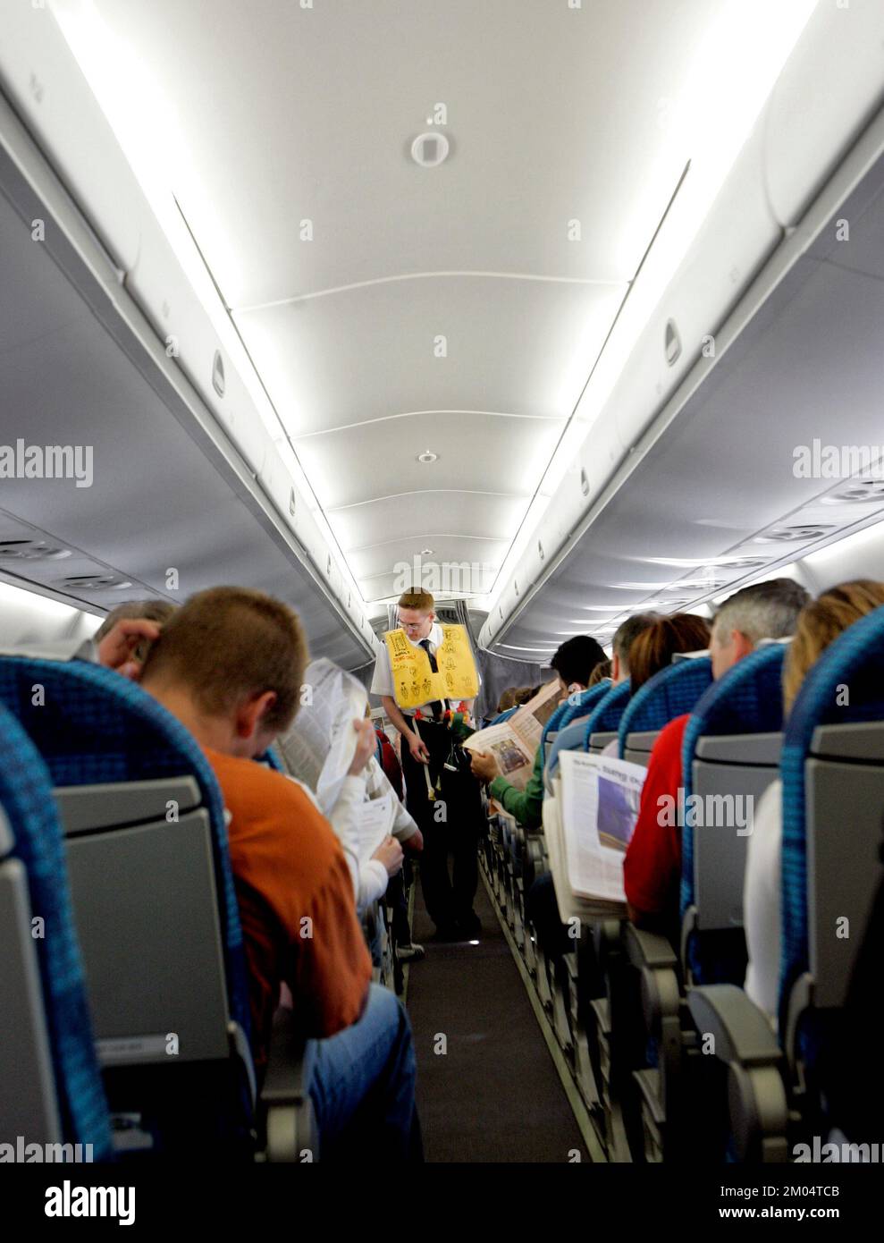 Finnair cabin crew, in airplanes at Arlanda Airport, demonstrate safety ...