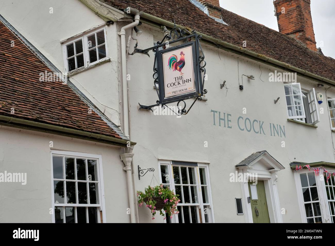 The Cock Inn Clare Suffolk showing pub sign Stock Photo - Alamy
