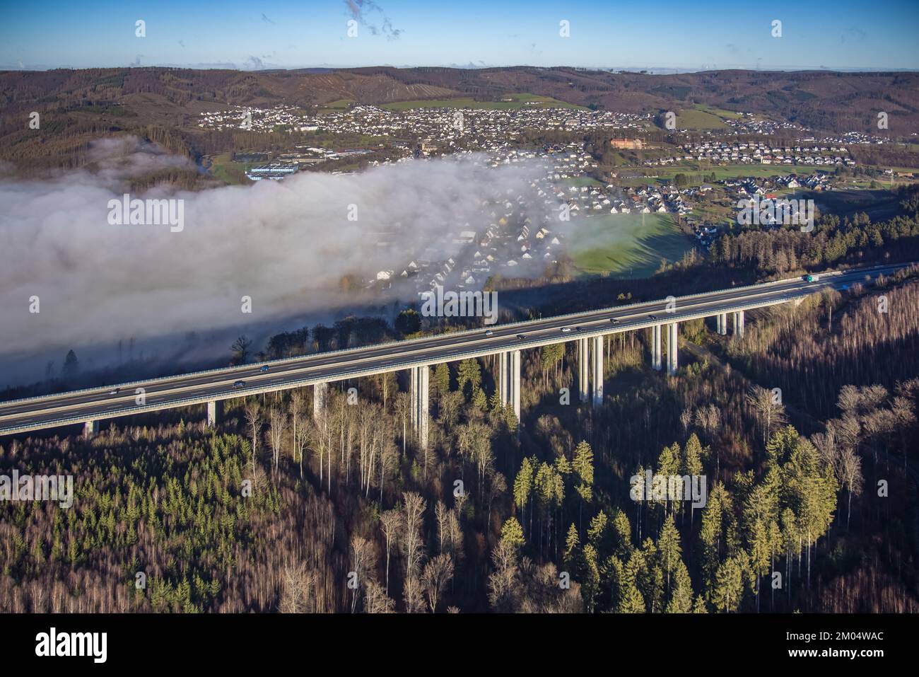Aerial view, fog at the valley bridge Hünenburg of the highway A46 in ...