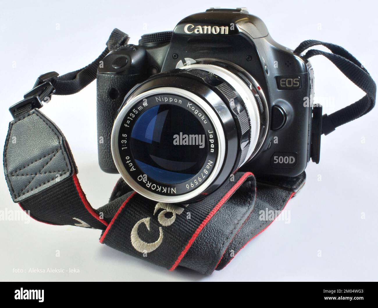 Nikon and Canon in action Stock Photo - Alamy