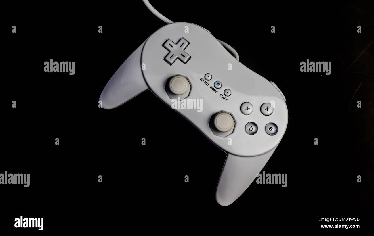 white joystick isolated on black background Stock Photo - Alamy