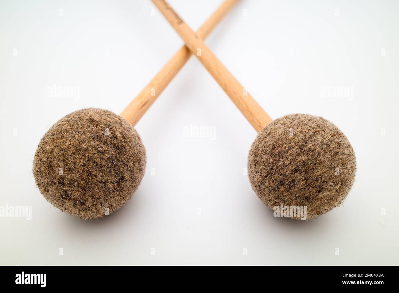 A pair of percussion sticks on white background Stock Photo - Alamy