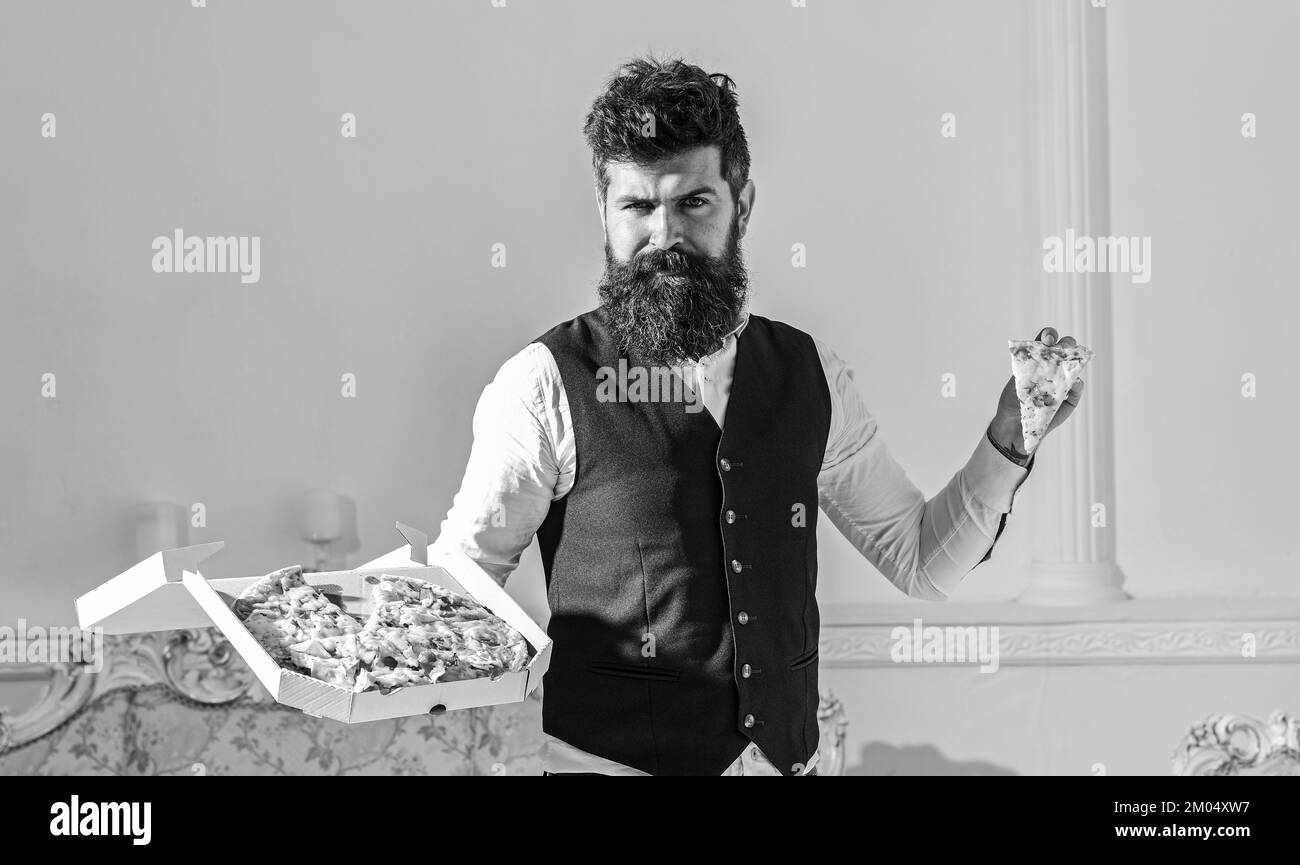 Man with beard and mustache holds delivered box with tasty fresh hot ...