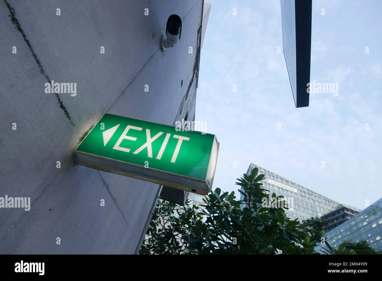 exit sign on brick wall Stock Photo - Alamy