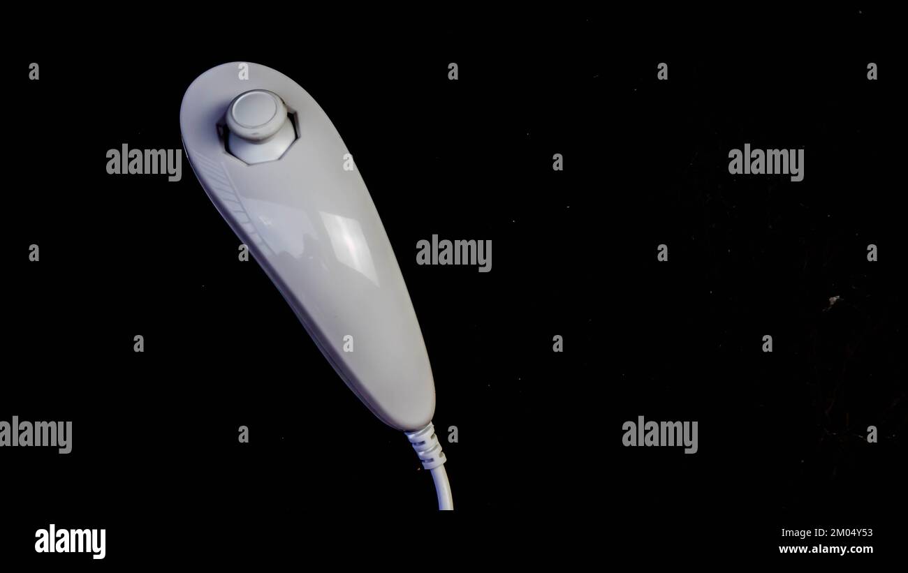 white joystick isolated on black background Stock Photo - Alamy