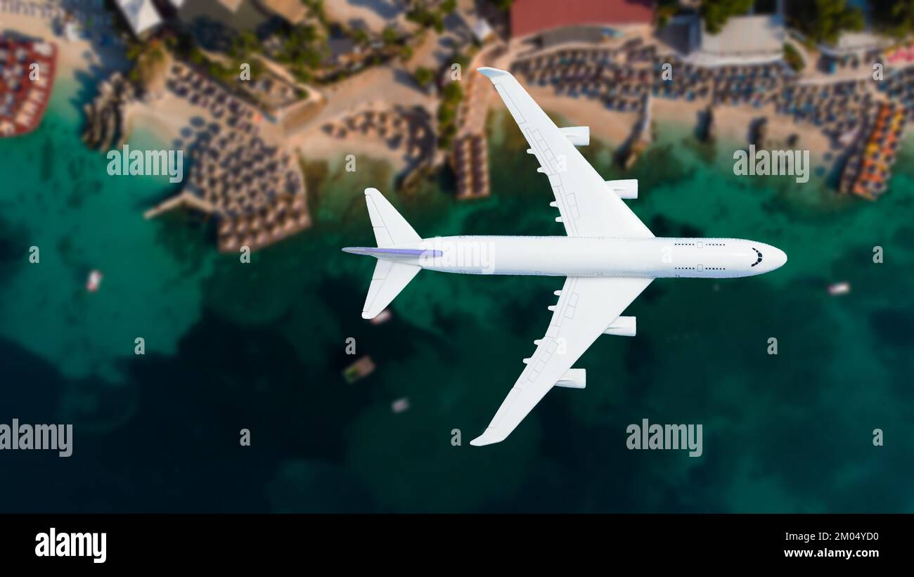 plane flies above the landscape. Side view of aircraft. Travel and ...