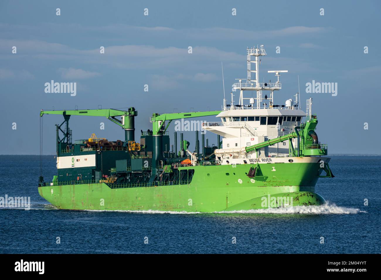 DEME trailing suction hopper dredger MEUSE RIVER on the river Elbe ...
