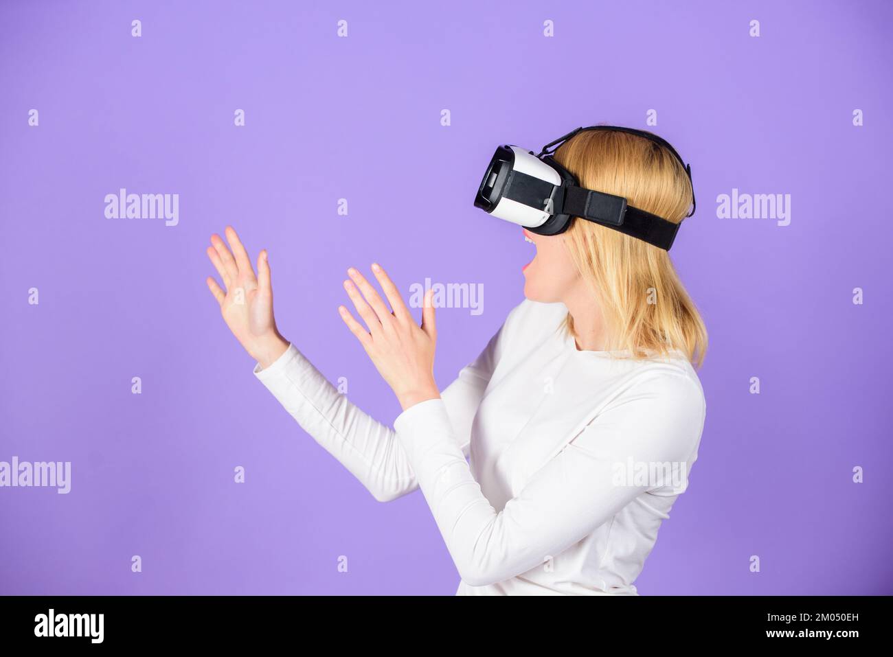 Girl use modern technology vr headset. Interact alternative reality ...