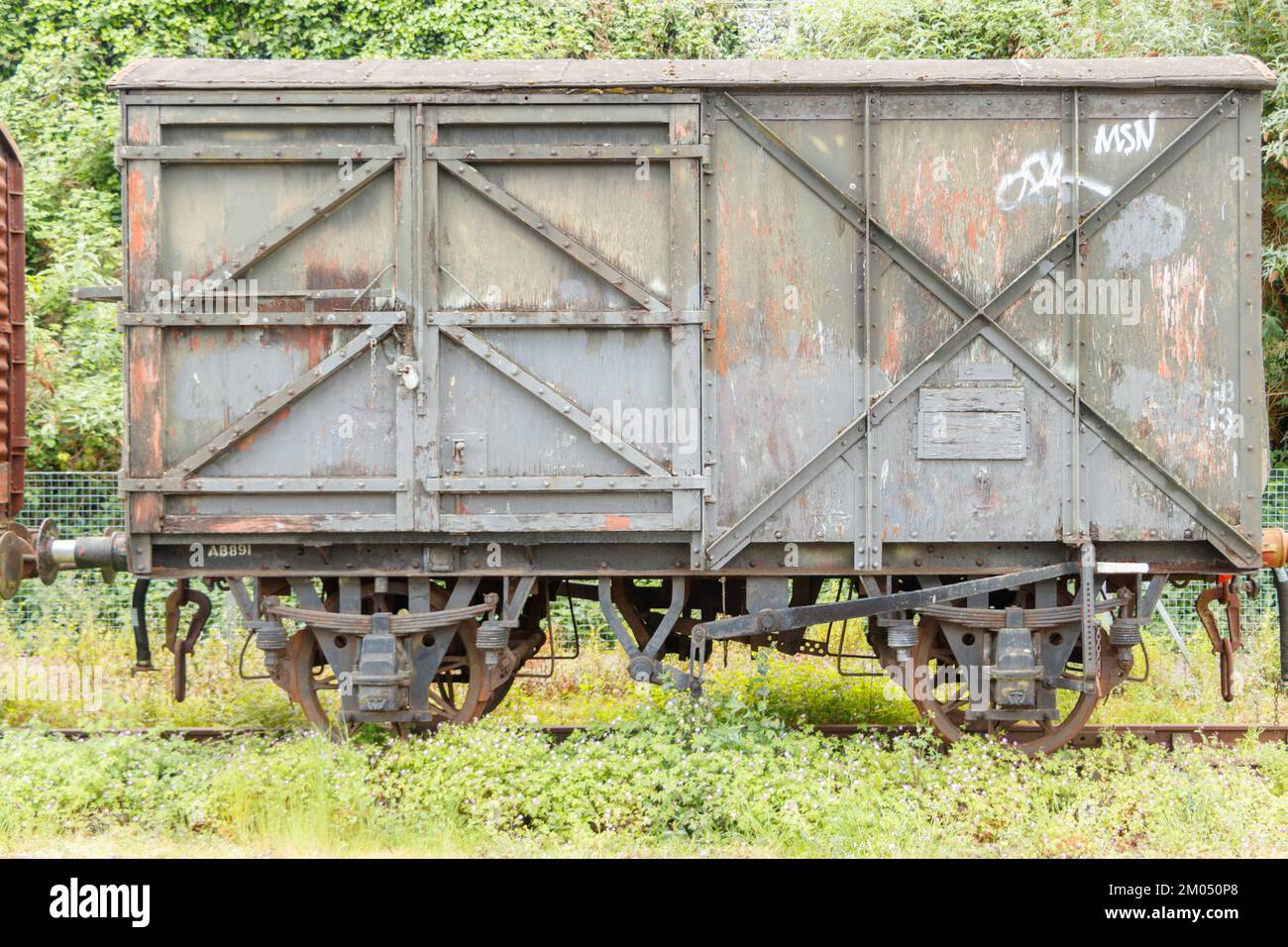 vintage railway freight wagon and tanker on rail line at bristol docks uk Stock Photo - Alamy