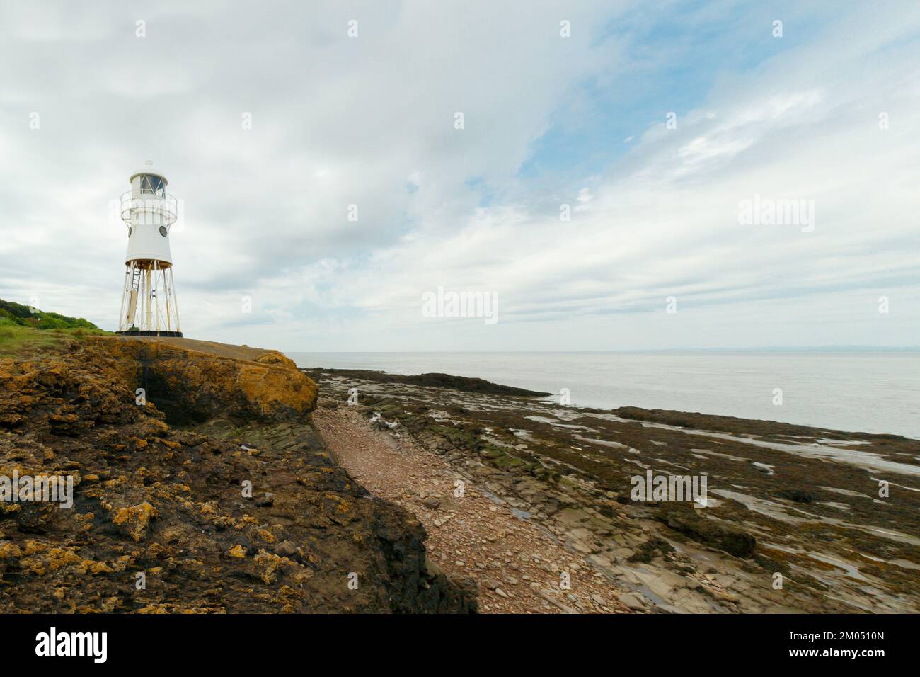 wide angle view Black Nore Pepperpot victorian lighthouse on rocky ...
