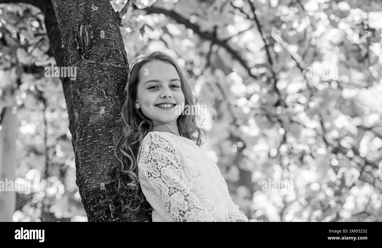 Girl On Smiling Face Standing Near Sakura Lean On Tree Trunk Girl