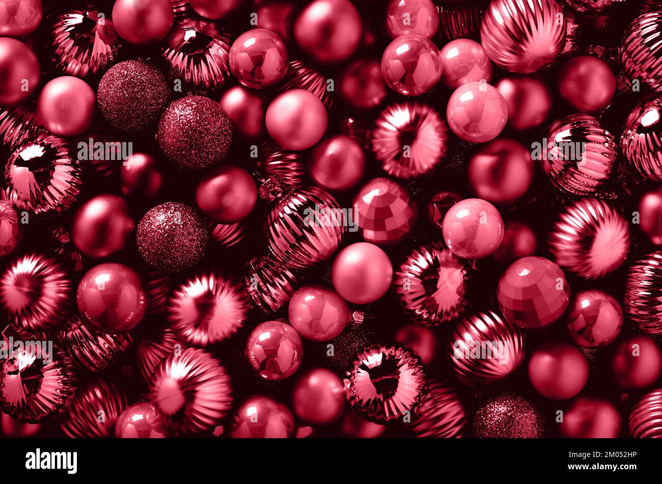 Shiny viva magenta Christmas balls as holiday background. Trendy color ...
