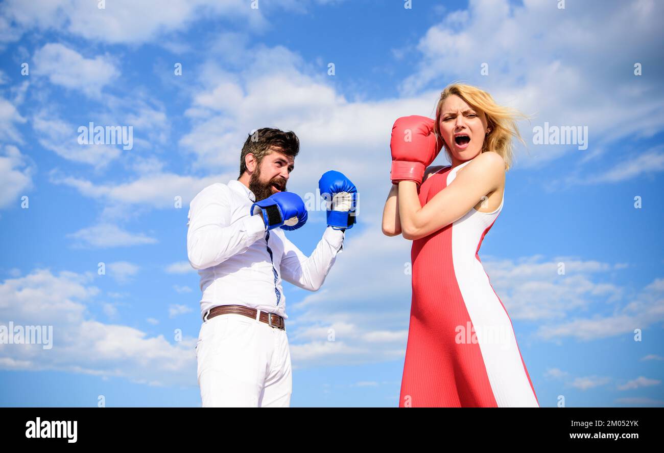 Be ready defend your point view. Man and woman fight boxing gloves blue ...