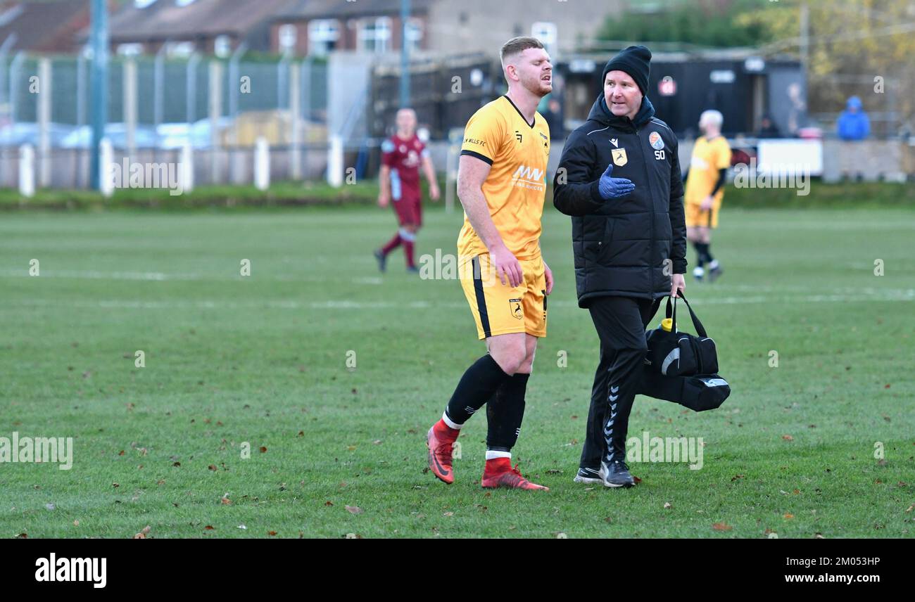 Semi-professional footballer leaving the field through injury Stock ...