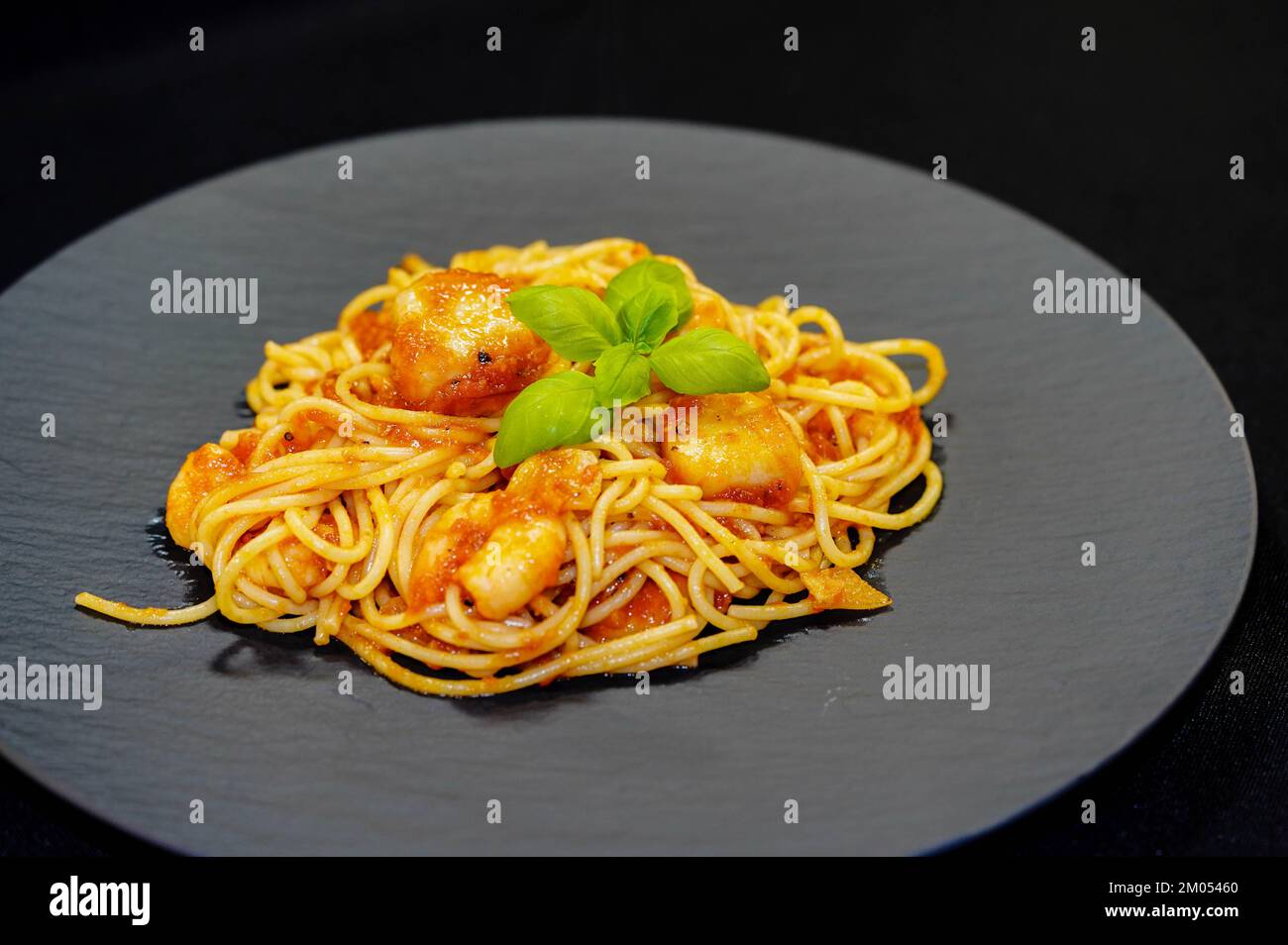 Spaghetti Rigate - italian pasta with scallops and shrimps Stock Photo ...