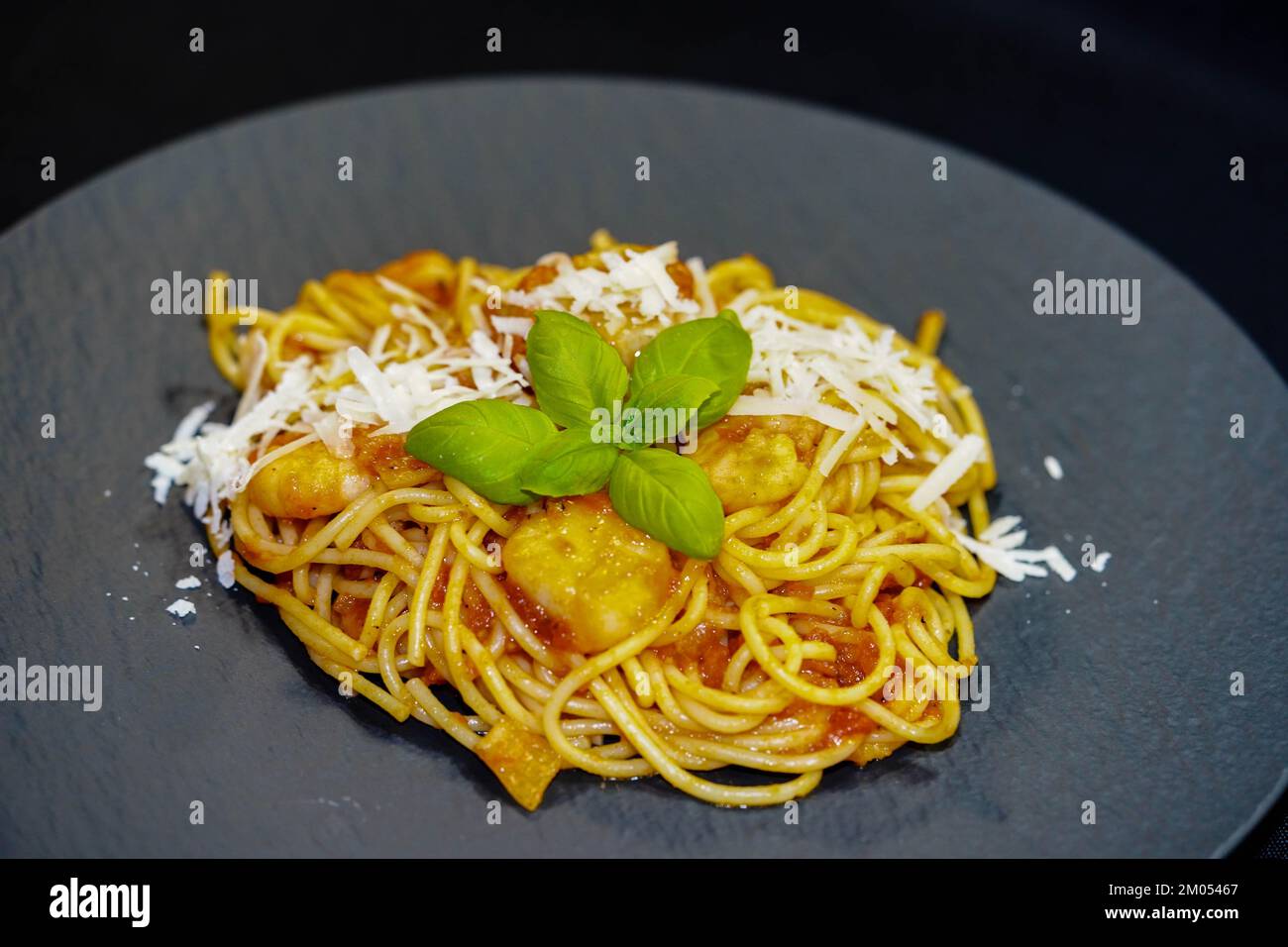 Spaghetti Rigate - italian pasta with scallops and shrimps Stock Photo ...