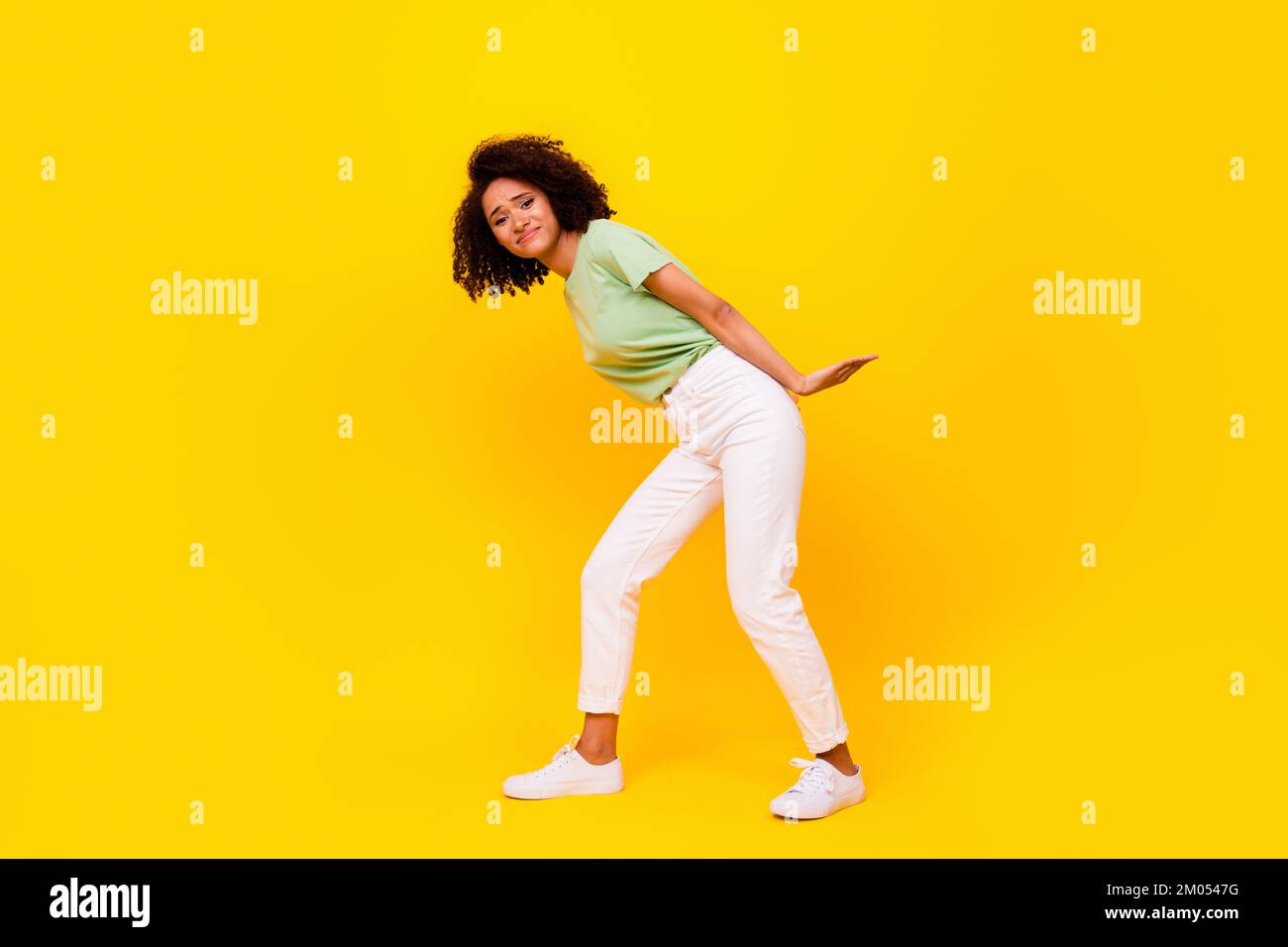 Full size photo of young adorable pretty cute funny lady hold hard ...
