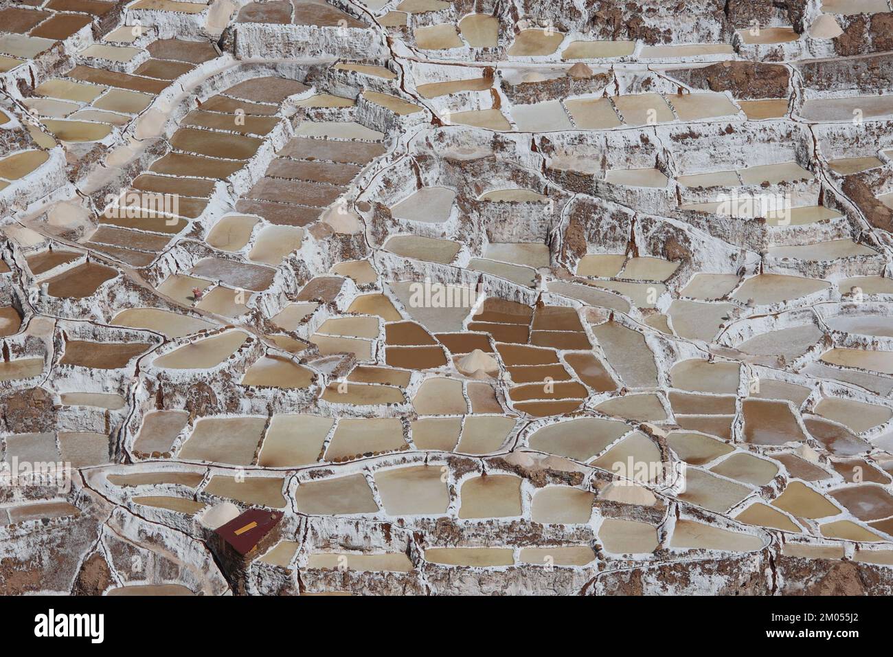 Traditional salt mines in Urubamba Peru Stock Photo - Alamy