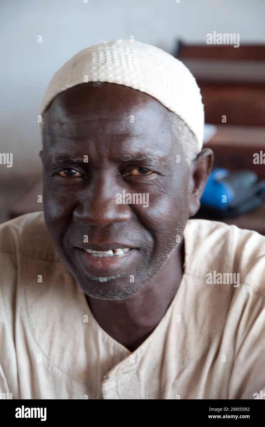 Faces of Africa, man, Bafata, Guinea Bissau - man with smile and skull ...