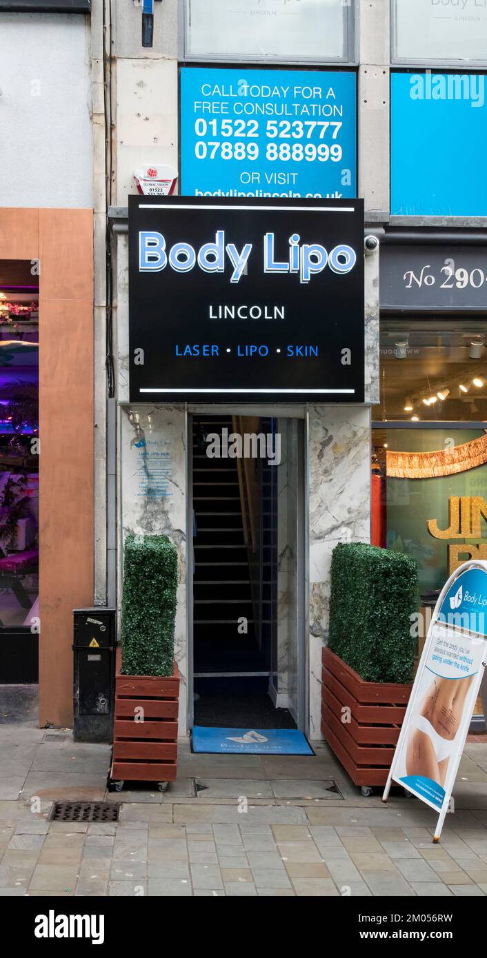 New sign above doorway, Body Lipo, High street Lincoln 2022 Stock Photo ...