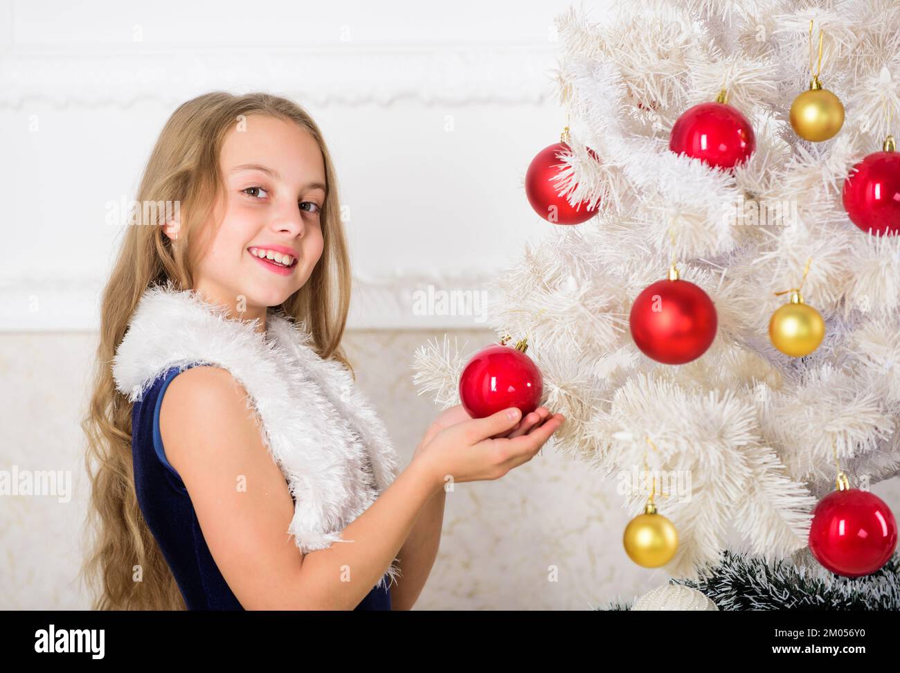 Family holiday concept. Girl velvet dress feel festive near christmas ...