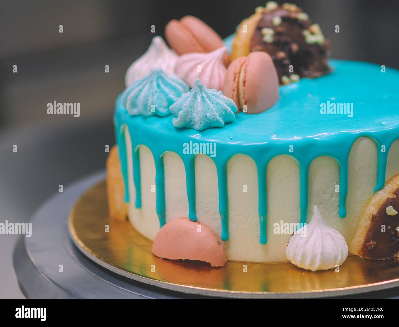 donuts meringue berries and sparkles topping on frosted icing drip ...